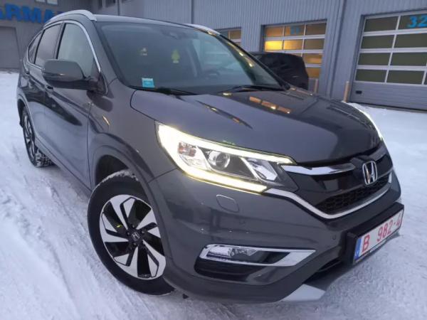 Grey Honda CR-V 2017 in Riga, with an engine capacity of 1.60 L and mileage of 160 thousand km for 15390 €, photo 4 on AUTOMOTO.COM.LV