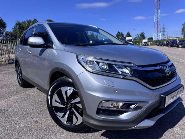 Grey Honda CR-V 2017 in Alytus, with an engine capacity of 1.60 L and mileage of 226 thousand km for 11950 €, photo 4 on AUTOMOTO.COM.LV