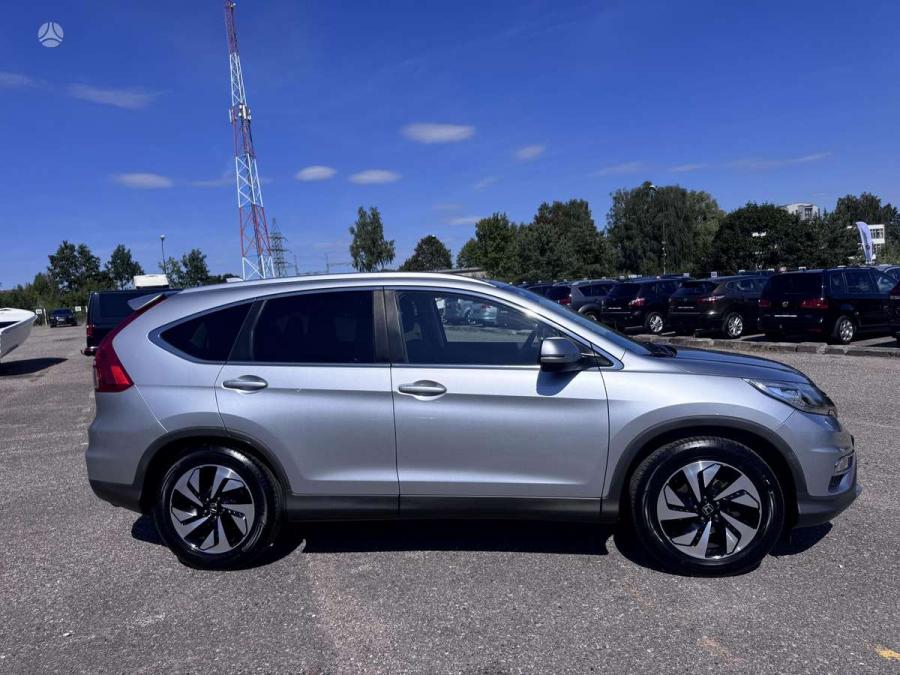 Grey Honda CR-V 2017 in Alytus, with an engine capacity of 1.60 L and mileage of 226 thousand km for 11950 €, photo 6 on AUTOMOTO.COM.LV