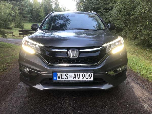 Grey Honda CR-V 2017 in Utena, with an engine capacity of 1.60 L and mileage of 265 thousand km for 12000 €, photo 1 on AUTOMOTO.COM.LV