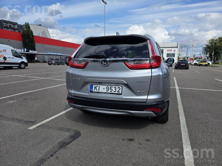 Grey Honda CR-V 2021 in Riga, with an engine capacity of 2.00 L and mileage of 100 thousand km for 25500 €, photo 1 on AUTOMOTO.COM.LV