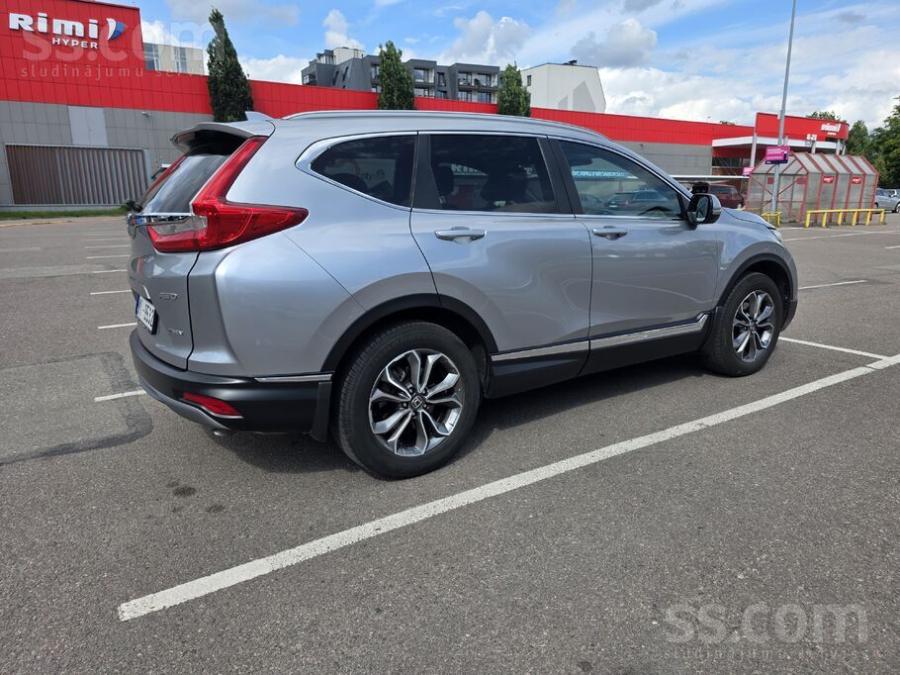 Grey Honda CR-V 2021 in Riga, with an engine capacity of 2.00 L and mileage of 100 thousand km for 25500 €, photo 3 on AUTOMOTO.COM.LV