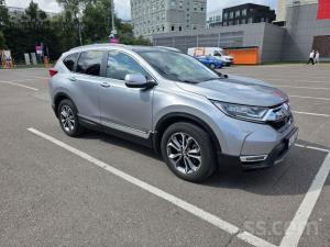 Grey Honda CR-V 2021 in Riga, with an engine capacity of 2.00 L and mileage of 100 thousand km for 25500 €, photo 4 on AUTOMOTO.COM.LV