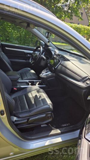 Grey Honda CR-V 2021 in Riga, with an engine capacity of 2.00 L and mileage of 100 thousand km for 25500 €, photo 6 on AUTOMOTO.COM.LV