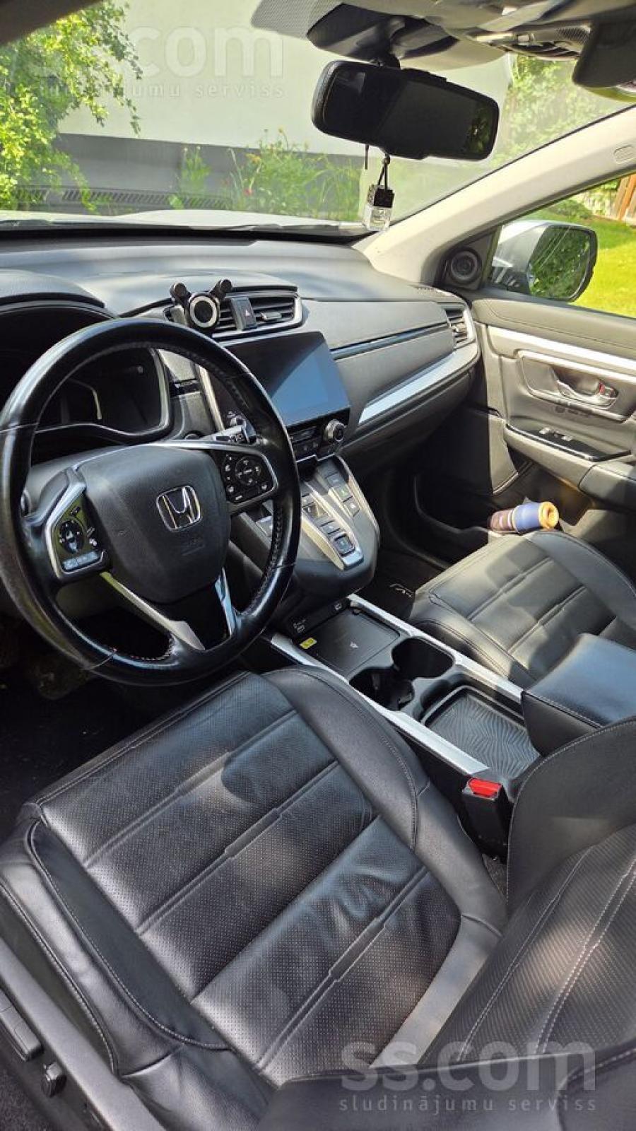 Grey Honda CR-V 2021 in Riga, with an engine capacity of 2.00 L and mileage of 100 thousand km for 25500 €, photo 7 on AUTOMOTO.COM.LV