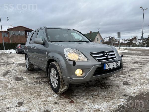 Pelēks Honda CR-V 2005 Cēsis, ar dzinēja tilpumu 2.20 L un nobraukumu 218 tūkst. km par 3400 €, foto 2 vietnē AUTOMOTO.COM.LV