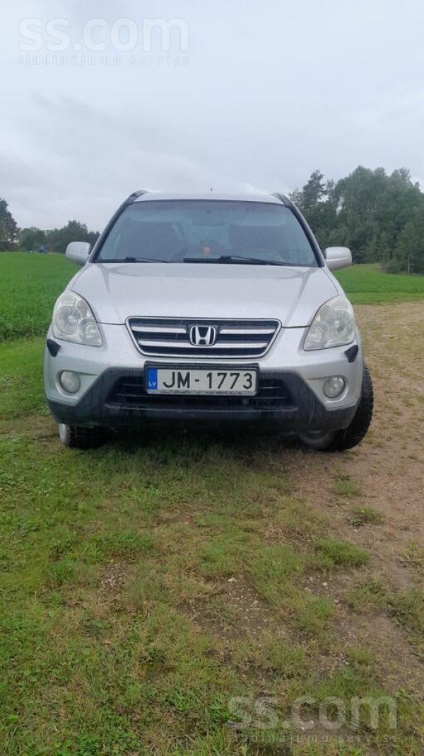 Grey Honda CR-V 2005 in Preili, with an engine capacity of 2.20 L and mileage of 370 thousand km for 2450 €, photo 1 on AUTOMOTO.COM.LV