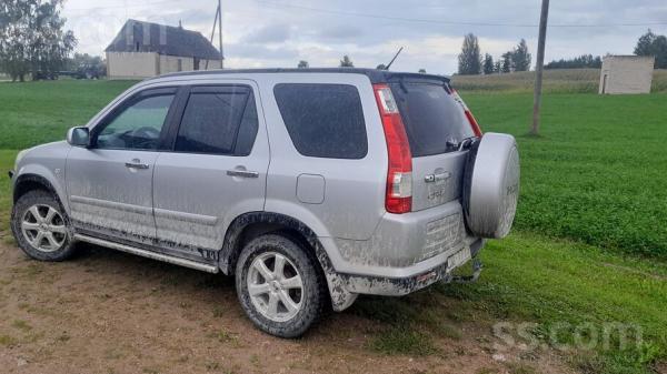Grey Honda CR-V 2005 in Preili, with an engine capacity of 2.20 L and mileage of 370 thousand km for 2450 €, photo 6 on AUTOMOTO.COM.LV