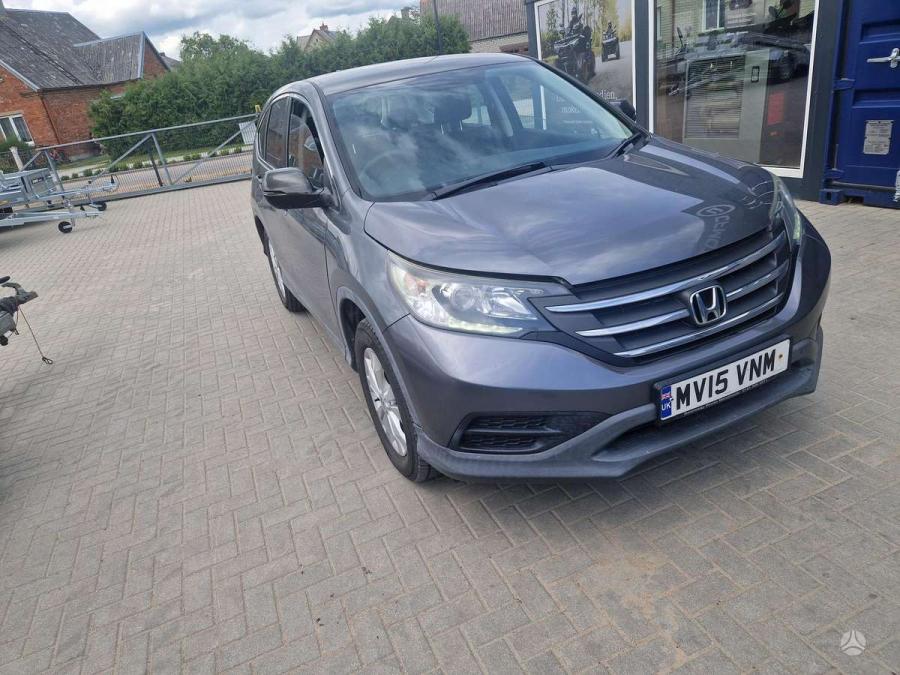 Pelēks Honda CR-V 2015 Tauragė, ar dzinēja tilpumu 2.19 L un nobraukumu 220 tūkst. km par 3750 €, foto 1 vietnē AUTOMOTO.COM.LV