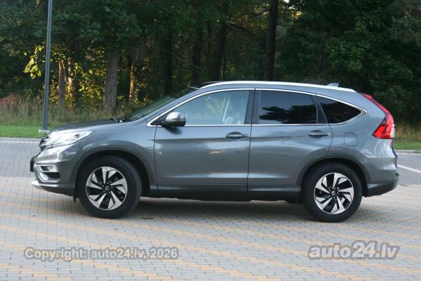 Grey Honda CR-V 2015 in Riga, with an engine capacity of 1.60 L and mileage of 315 thousand km for 10250 €, photo 4 on AUTOMOTO.COM.LV