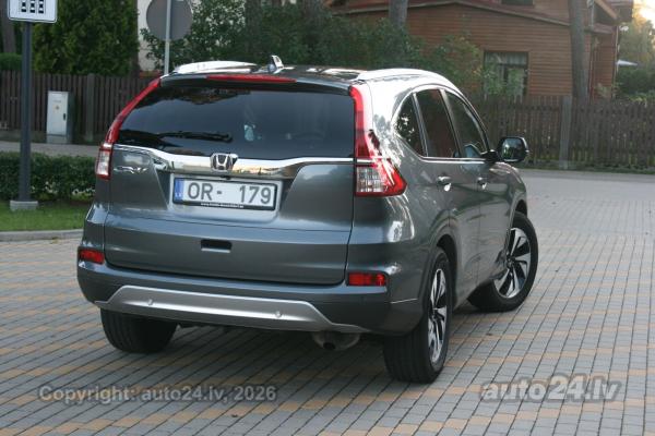 Grey Honda CR-V 2015 in Riga, with an engine capacity of 1.60 L and mileage of 315 thousand km for 10250 €, photo 5 on AUTOMOTO.COM.LV