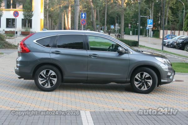 Grey Honda CR-V 2015 in Riga, with an engine capacity of 1.60 L and mileage of 315 thousand km for 10250 €, photo 6 on AUTOMOTO.COM.LV