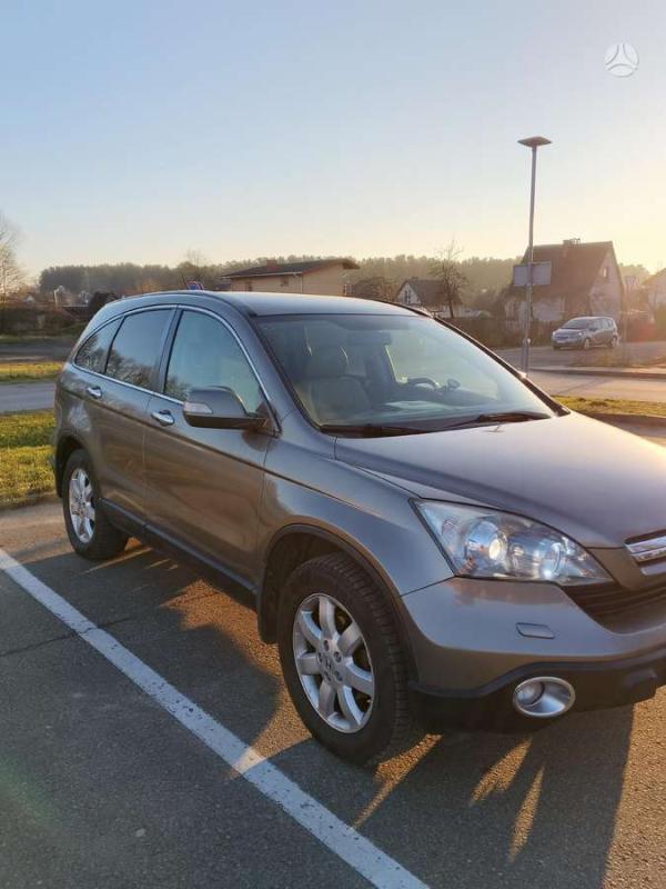 Grey Honda CR-V 2008 in Klaipeda, with an engine capacity of 2.00 L and mileage of 217 thousand km for 5200 €, photo 1 on AUTOMOTO.COM.LV