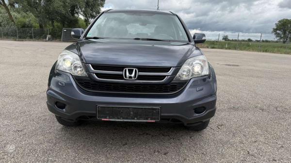 Pelēks Honda CR-V 2011 Marijampole, ar dzinēja tilpumu 2.20 L un nobraukumu 272 tūkst. km par 6900 €, foto 2 vietnē AUTOMOTO.COM.LV