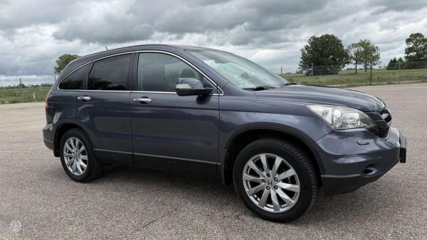 Pelēks Honda CR-V 2011 Marijampole, ar dzinēja tilpumu 2.20 L un nobraukumu 272 tūkst. km par 6900 €, foto 4 vietnē AUTOMOTO.COM.LV