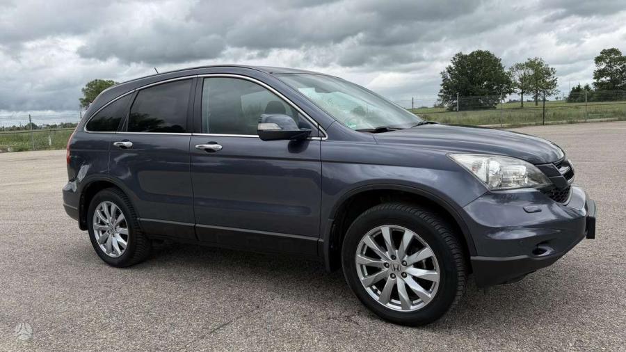 Pelēks Honda CR-V 2011 Marijampole, ar dzinēja tilpumu 2.20 L un nobraukumu 272 tūkst. km par 6900 €, foto 5 vietnē AUTOMOTO.COM.LV