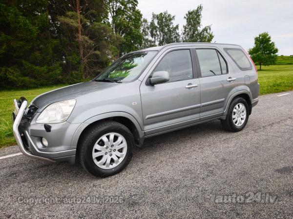 Pelēks Honda CR-V 2006 Paide, ar dzinēja tilpumu 2.20 L un nobraukumu 224 tūkst. km par 3290 €, foto 4 vietnē AUTOMOTO.COM.LV