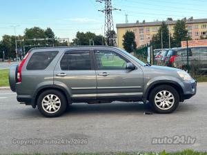 Grey Honda CR-V 2006 in Narva, with an engine capacity of 2.00 L and mileage of 240 thousand km for 2499 €, photo 5 on AUTOMOTO.COM.LV