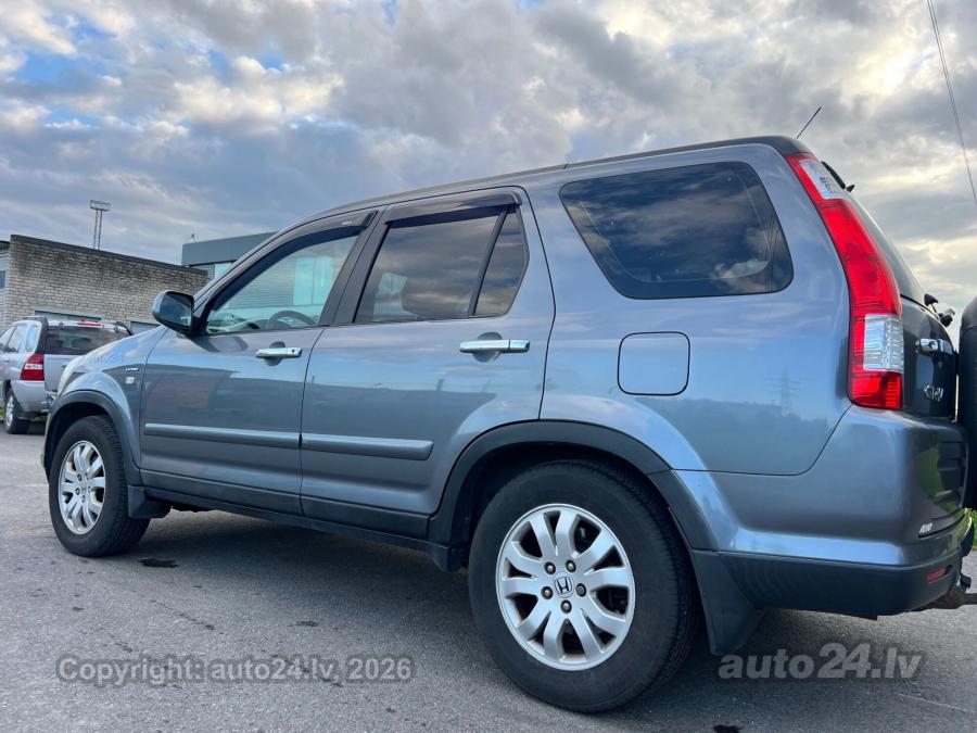 Grey Honda CR-V 2006 in Narva, with an engine capacity of 2.00 L and mileage of 240 thousand km for 2499 €, photo 10 on AUTOMOTO.COM.LV