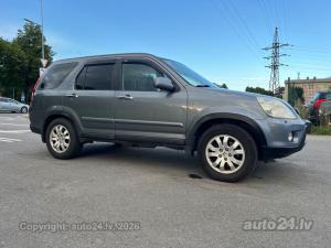 Grey Honda CR-V 2006 in Narva, with an engine capacity of 2.00 L and mileage of 240 thousand km for 2499 €, photo 12 on AUTOMOTO.COM.LV