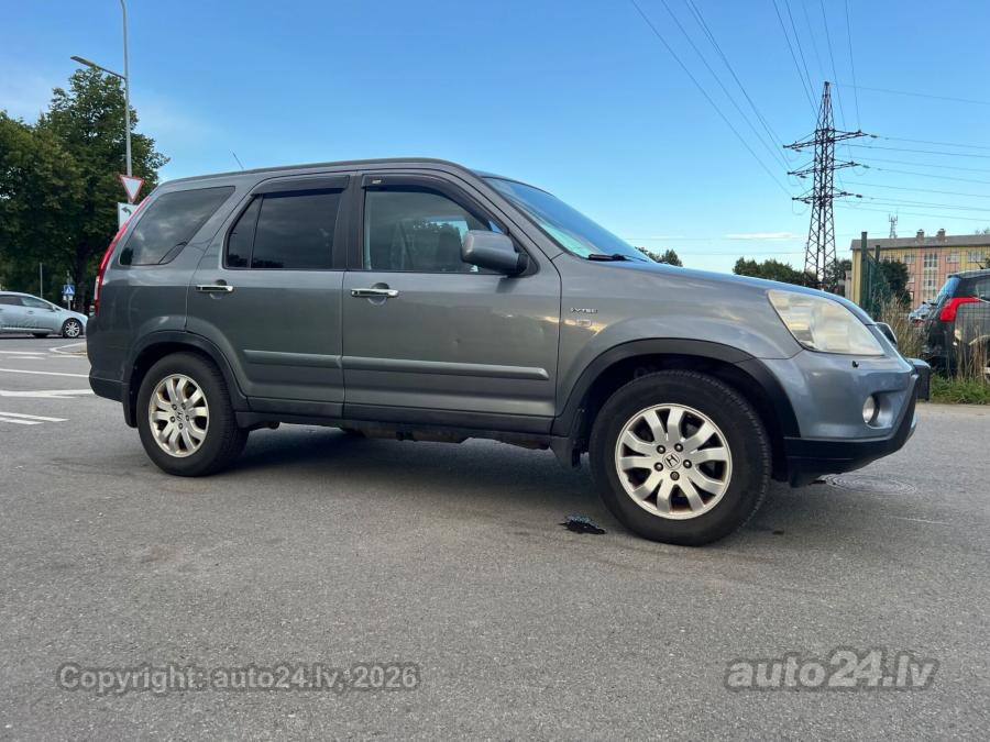 Grey Honda CR-V 2006 in Narva, with an engine capacity of 2.00 L and mileage of 240 thousand km for 2499 €, photo 12 on AUTOMOTO.COM.LV
