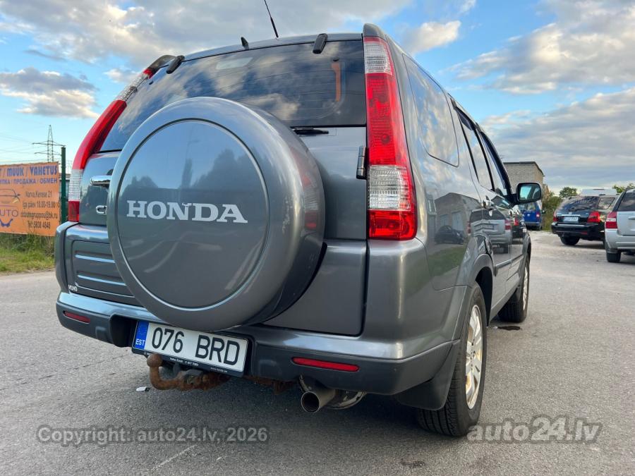 Grey Honda CR-V 2006 in Narva, with an engine capacity of 2.00 L and mileage of 240 thousand km for 2499 €, photo 13 on AUTOMOTO.COM.LV