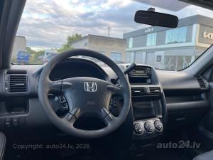 Grey Honda CR-V 2006 in Narva, with an engine capacity of 2.00 L and mileage of 240 thousand km for 2499 €, photo 18 on AUTOMOTO.COM.LV