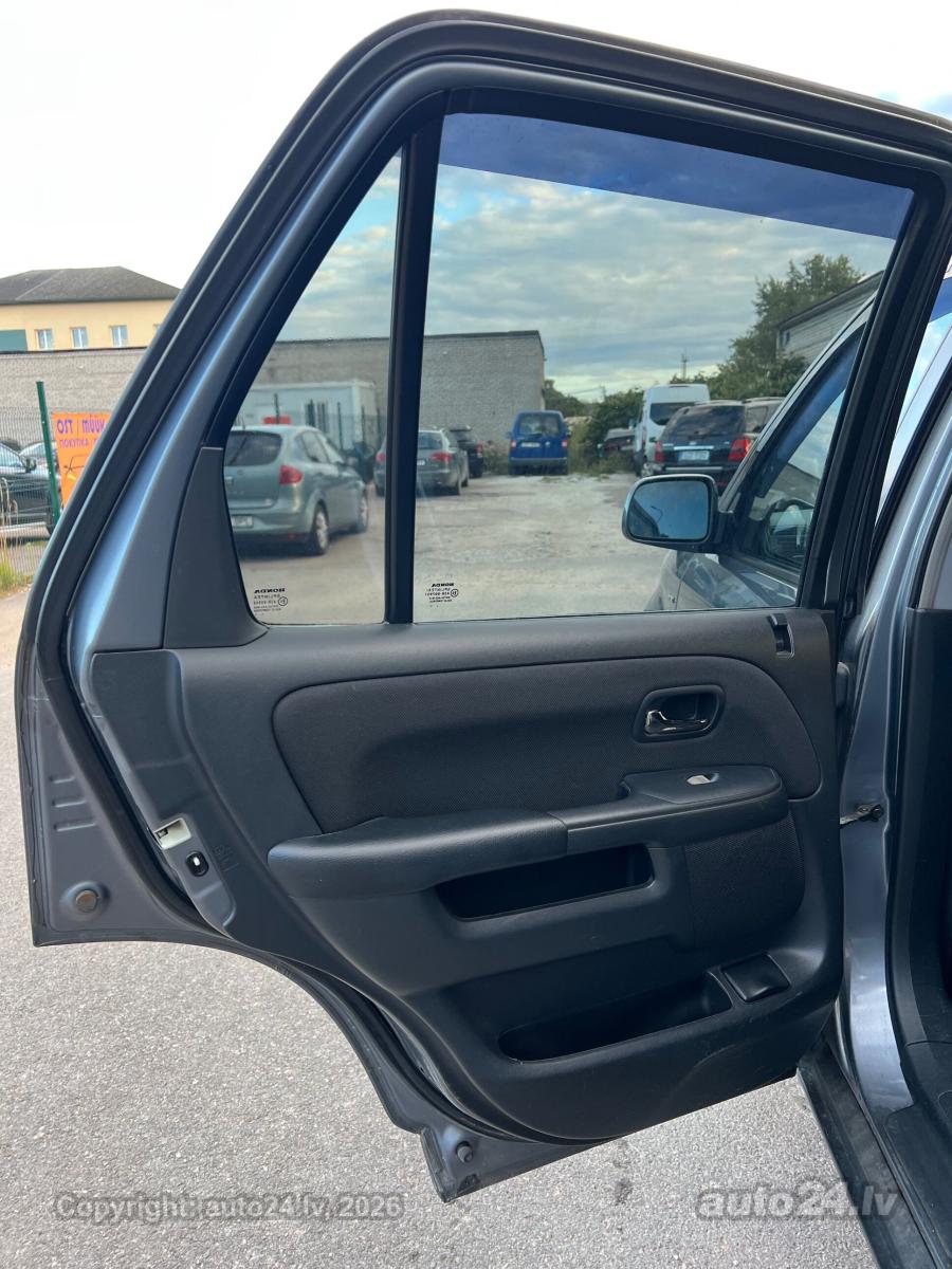 Grey Honda CR-V 2006 in Narva, with an engine capacity of 2.00 L and mileage of 240 thousand km for 2499 €, photo 21 on AUTOMOTO.COM.LV