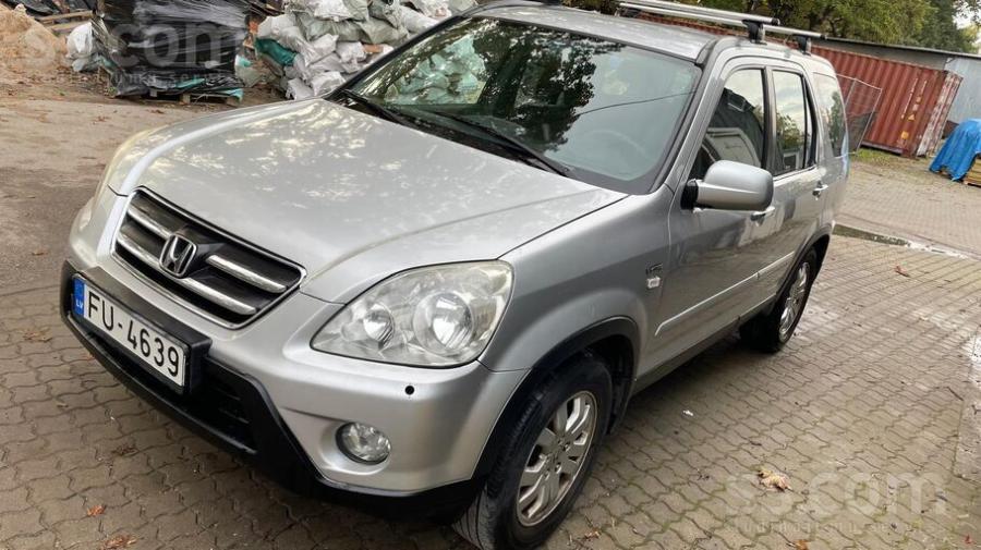 Grey Honda CR-V 2006 in Riga, with an engine capacity of 2.00 L and mileage of 212 thousand km for 2570 €, photo 1 on AUTOMOTO.COM.LV