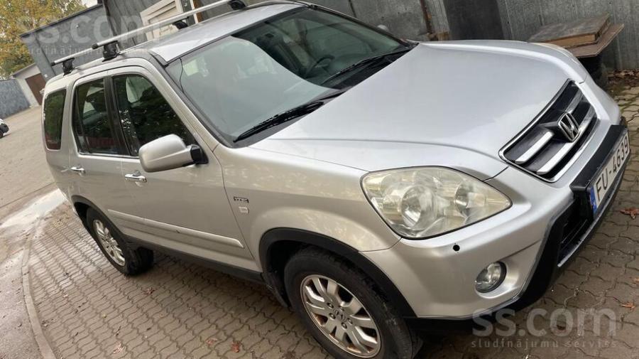 Grey Honda CR-V 2006 in Riga, with an engine capacity of 2.00 L and mileage of 212 thousand km for 2570 €, photo 3 on AUTOMOTO.COM.LV