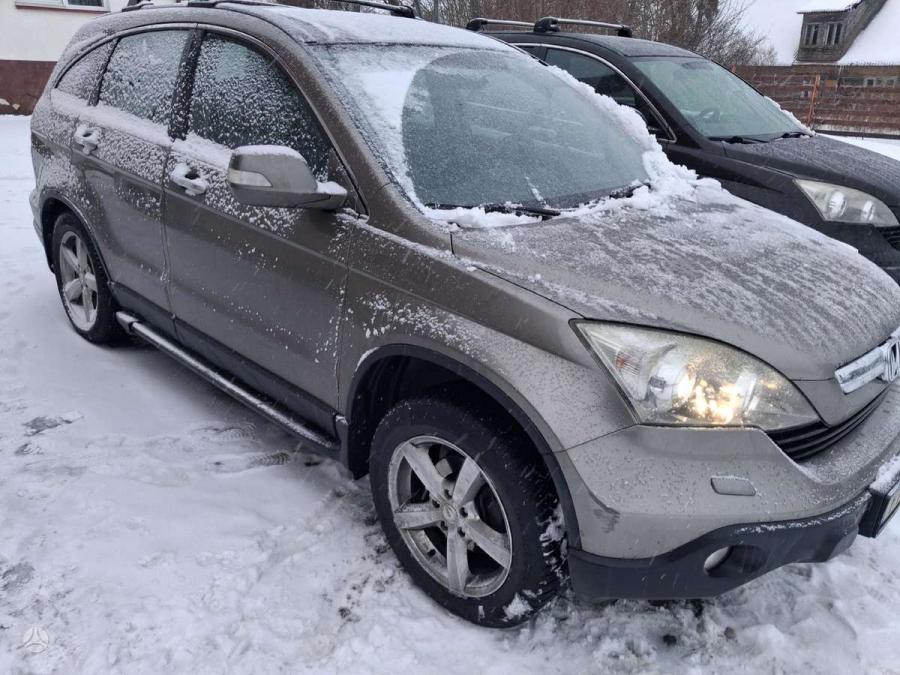 Grey Honda CR-V 2009 in Prienai, with an engine capacity of 2.20 L and mileage of 250 thousand km for 2700 €, photo 1 on AUTOMOTO.COM.LV