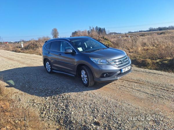 Grey Honda CR-V 2014 in Tallinn, with an engine capacity of 2.00 L and mileage of 200 thousand km for 9990 €, photo 2 on AUTOMOTO.COM.LV