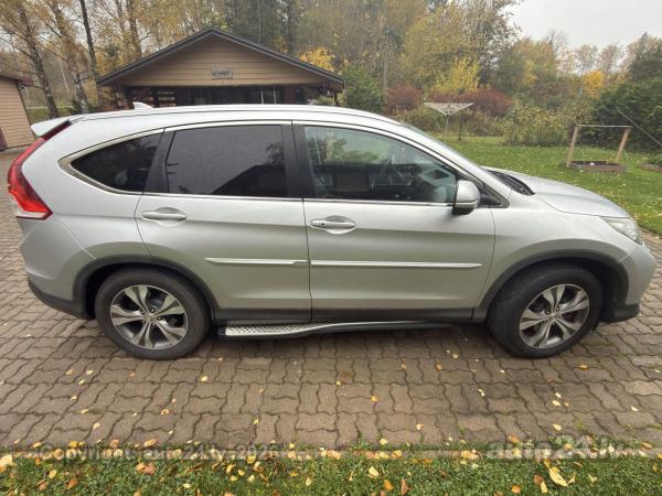 Grey Honda CR-V 2014 in Johvi, with an engine capacity of 2.20 L and mileage of 227 thousand km for 11000 €, photo 4 on AUTOMOTO.COM.LV