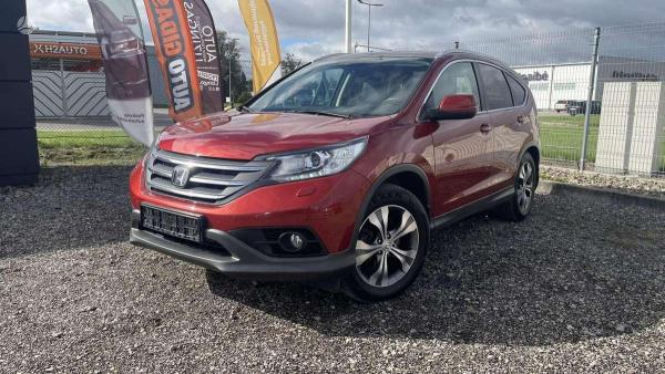 Orange Honda CR-V 2012 in Marijampole, with an engine capacity of 2.20 L and mileage of 219 thousand km for 9990 €, photo 6 on AUTOMOTO.COM.LV