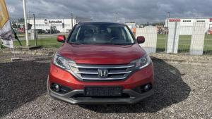 Orange Honda CR-V 2012 in Marijampole, with an engine capacity of 2.20 L and mileage of 219 thousand km for 9990 €, photo 7 on AUTOMOTO.COM.LV