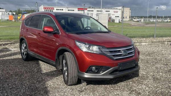 Orange Honda CR-V 2012 in Marijampole, with an engine capacity of 2.20 L and mileage of 219 thousand km for 9990 €, photo 8 on AUTOMOTO.COM.LV