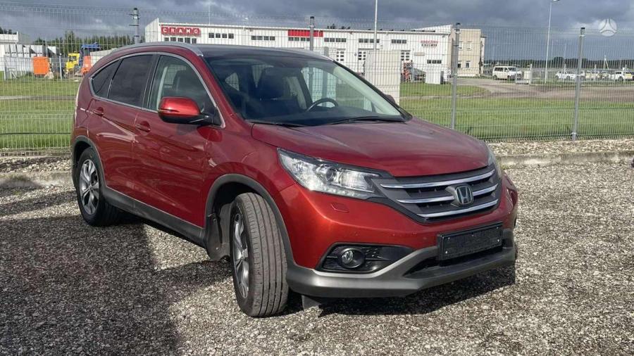 Orange Honda CR-V 2012 in Marijampole, with an engine capacity of 2.20 L and mileage of 219 thousand km for 9990 €, photo 8 on AUTOMOTO.COM.LV