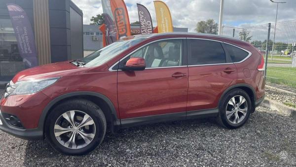 Orange Honda CR-V 2012 in Marijampole, with an engine capacity of 2.20 L and mileage of 219 thousand km for 9990 €, photo 9 on AUTOMOTO.COM.LV
