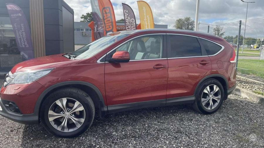 Orange Honda CR-V 2012 in Marijampole, with an engine capacity of 2.20 L and mileage of 219 thousand km for 9990 €, photo 9 on AUTOMOTO.COM.LV