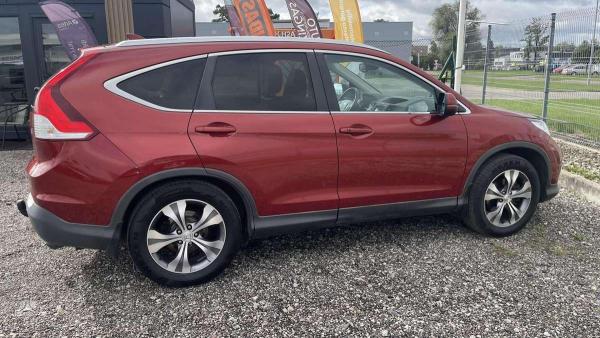 Orange Honda CR-V 2012 in Marijampole, with an engine capacity of 2.20 L and mileage of 219 thousand km for 9990 €, photo 10 on AUTOMOTO.COM.LV