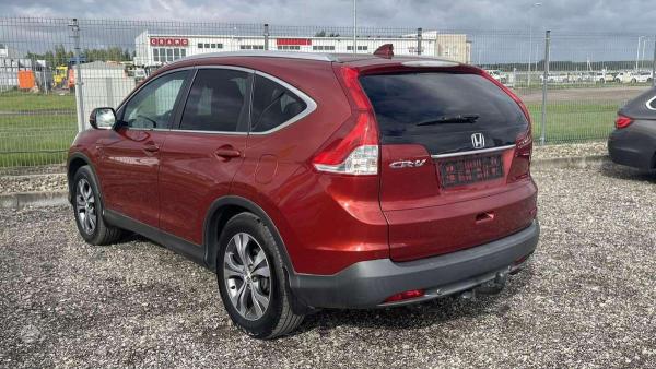 Orange Honda CR-V 2012 in Marijampole, with an engine capacity of 2.20 L and mileage of 219 thousand km for 9990 €, photo 11 on AUTOMOTO.COM.LV