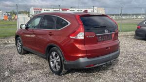 Orange Honda CR-V 2012 in Marijampole, with an engine capacity of 2.20 L and mileage of 219 thousand km for 9990 €, photo 11 on AUTOMOTO.COM.LV