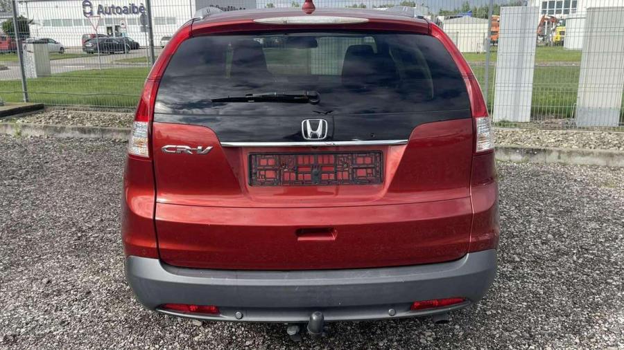 Orange Honda CR-V 2012 in Marijampole, with an engine capacity of 2.20 L and mileage of 219 thousand km for 9990 €, photo 12 on AUTOMOTO.COM.LV