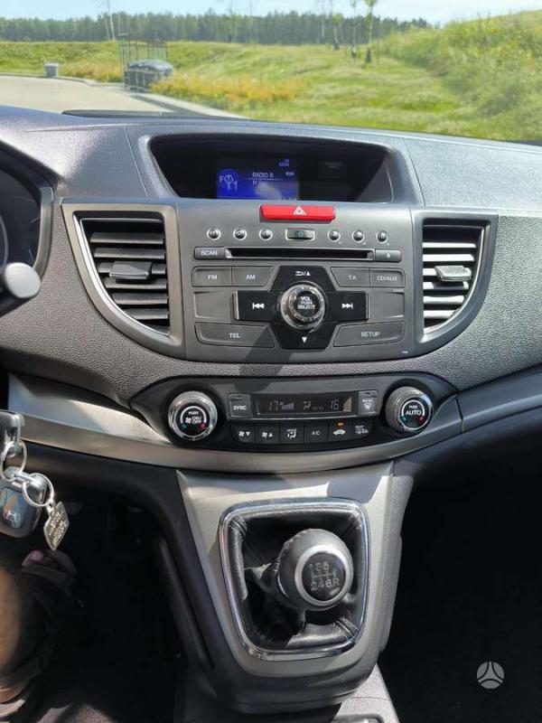 Orange Honda CR-V 2014 in Vilnius, with an engine capacity of 1.60 L and mileage of 239 thousand km for 8500 €, photo 9 on AUTOMOTO.COM.LV