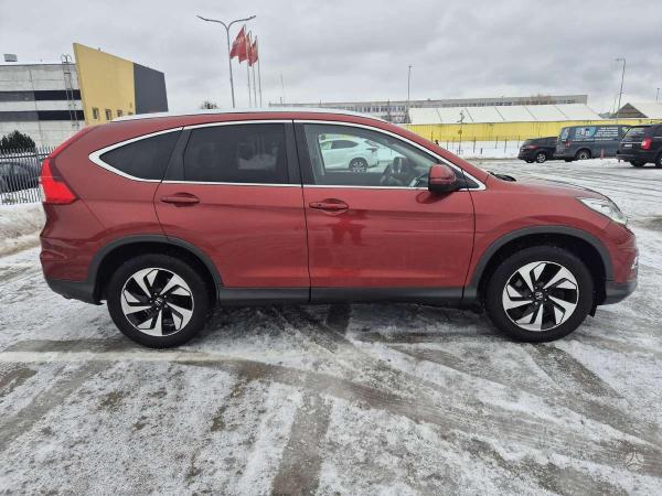 Orange Honda CR-V 2015 in Taurage, with an engine capacity of 1.60 L and mileage of 220 thousand km for 12300 €, photo 4 on AUTOMOTO.COM.LV