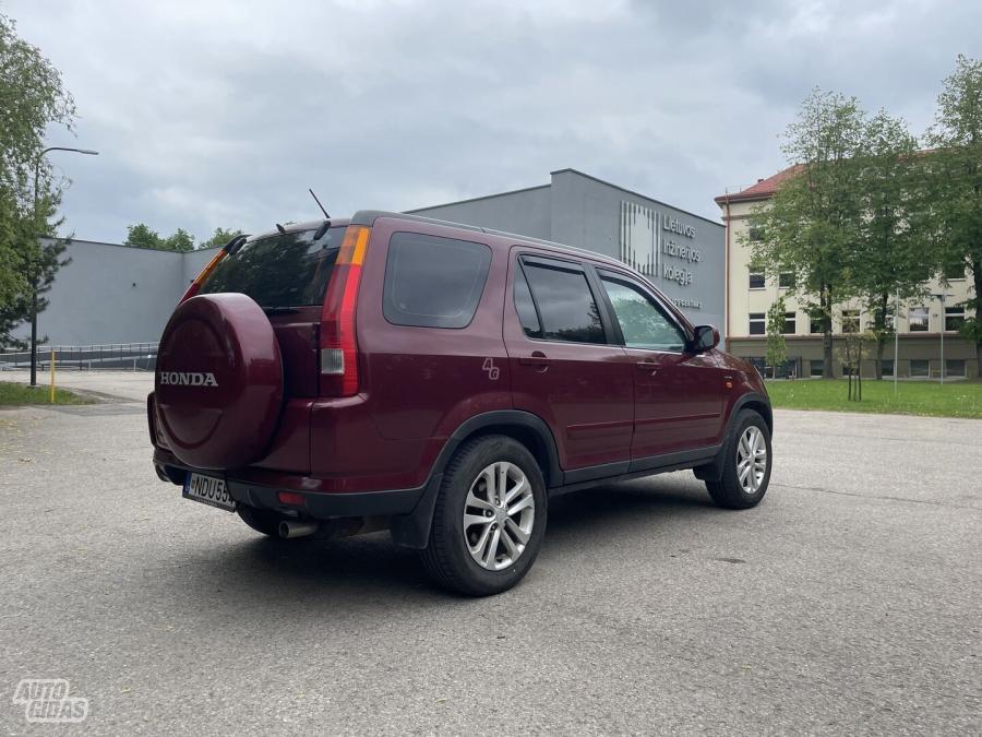 Red Honda CR-V 2002 in Kaunas, with an engine capacity of 2.00 L and mileage of 380 thousand km for 3200 €, photo 7 on AUTOMOTO.COM.LV