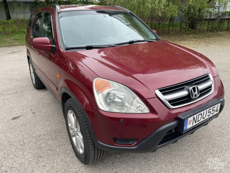 Red Honda CR-V 2002 in Kaunas, with an engine capacity of 2.00 L and mileage of 380 thousand km for 3200 €, photo 9 on AUTOMOTO.COM.LV