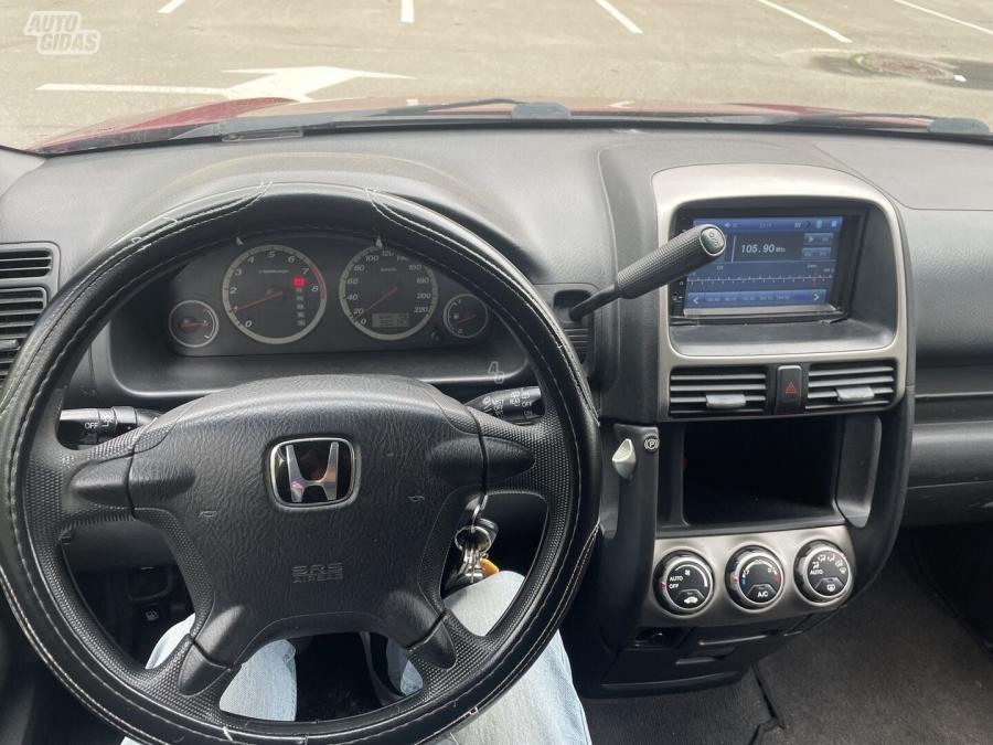 Red Honda CR-V 2002 in Kaunas, with an engine capacity of 2.00 L and mileage of 380 thousand km for 3200 €, photo 13 on AUTOMOTO.COM.LV