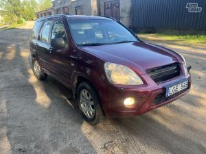 Red Honda CR-V 2006 in Ignalina, with an engine capacity of 2.00 L and mileage of 220 thousand km for 1650 €, photo 3 on AUTOMOTO.COM.LV