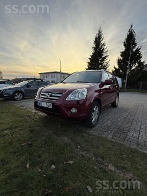 Sarkans Honda CR-V 2006 Rīga, ar dzinēja tilpumu 2.00 L un nobraukumu 202 tūkst. km par 2600 €, foto  vietnē AUTOMOTO.COM.LV